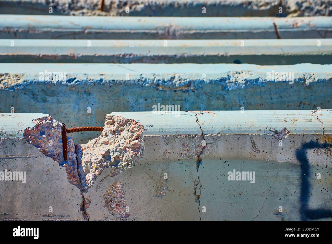 Weathered Concrete Beams with Cracks and Rusted Rebar Eye-Level View ...