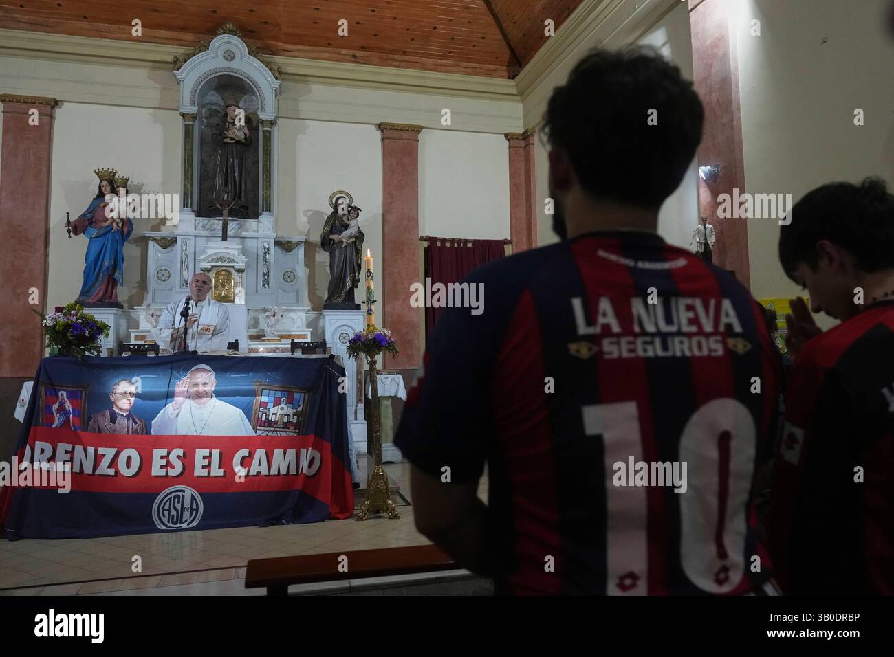 Fans of San Lorenzo soccer club attend a Mass at San Antonio Parish in ...