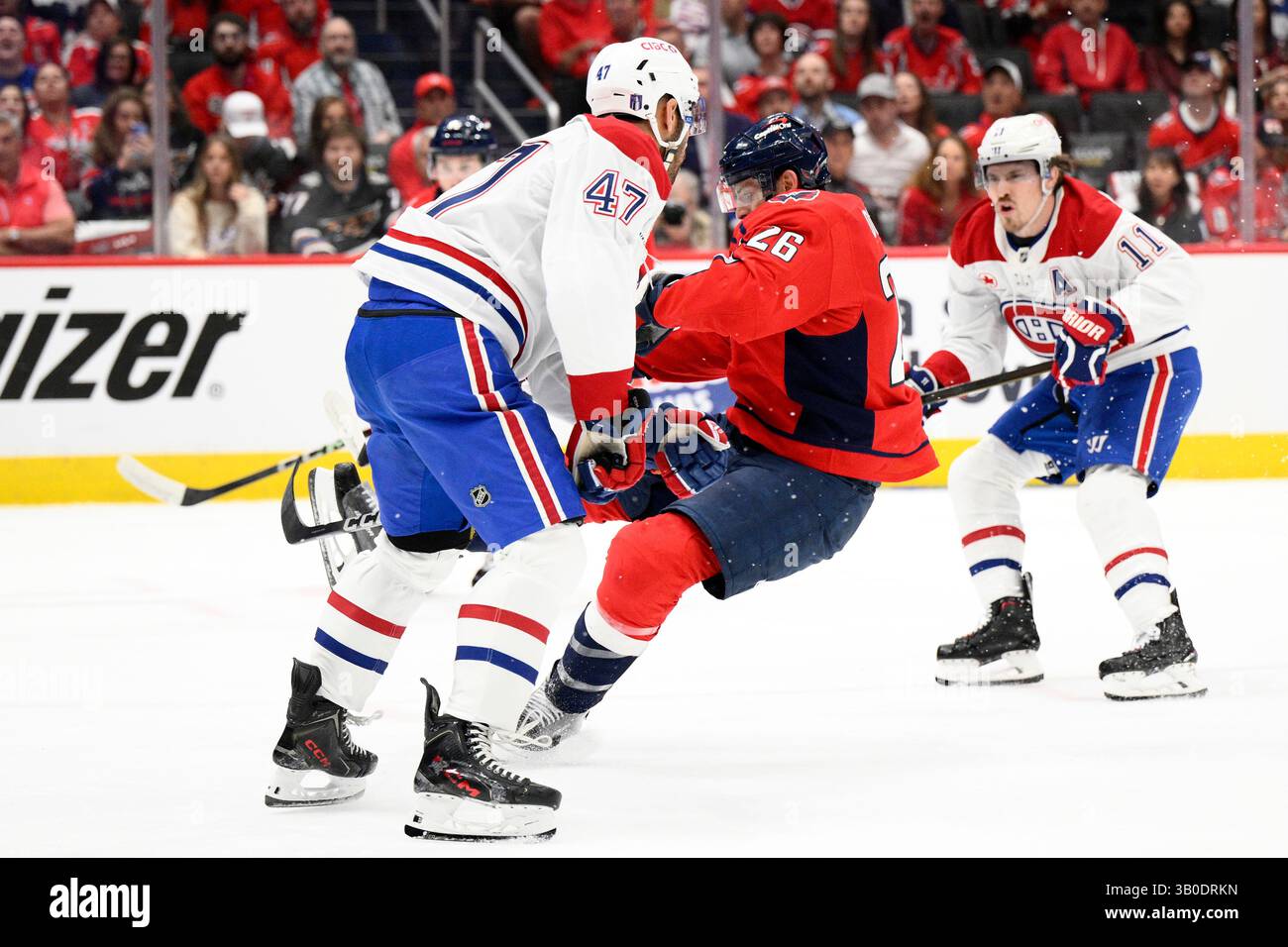 Montreal Canadiens defenseman Jayden Struble (47) hits Washington ...
