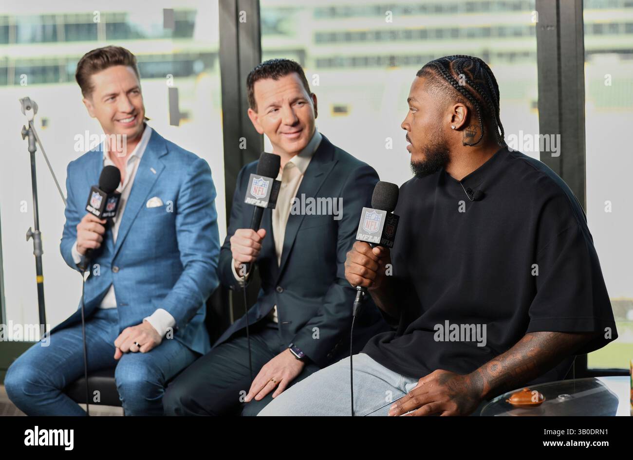 Tom Pelissero, from left, Ian Rapoport and Green Bay Packers running ...
