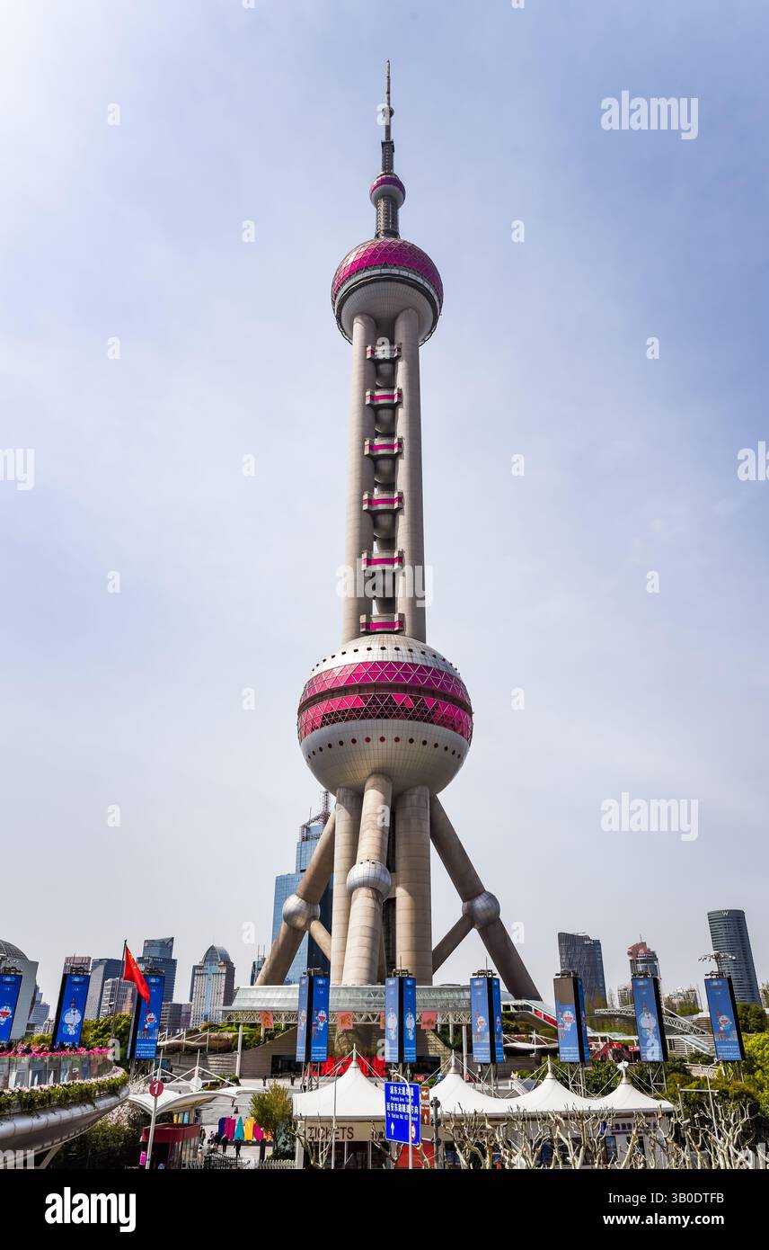 Shanghai, China - 1 April 2025: The Oriental Pearl Tower shines under ...