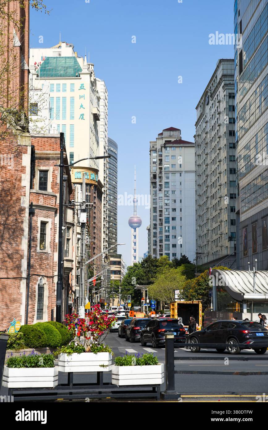 Shanghai, China - 1 April 2025: The Oriental Pearl Tower emerges in a ...