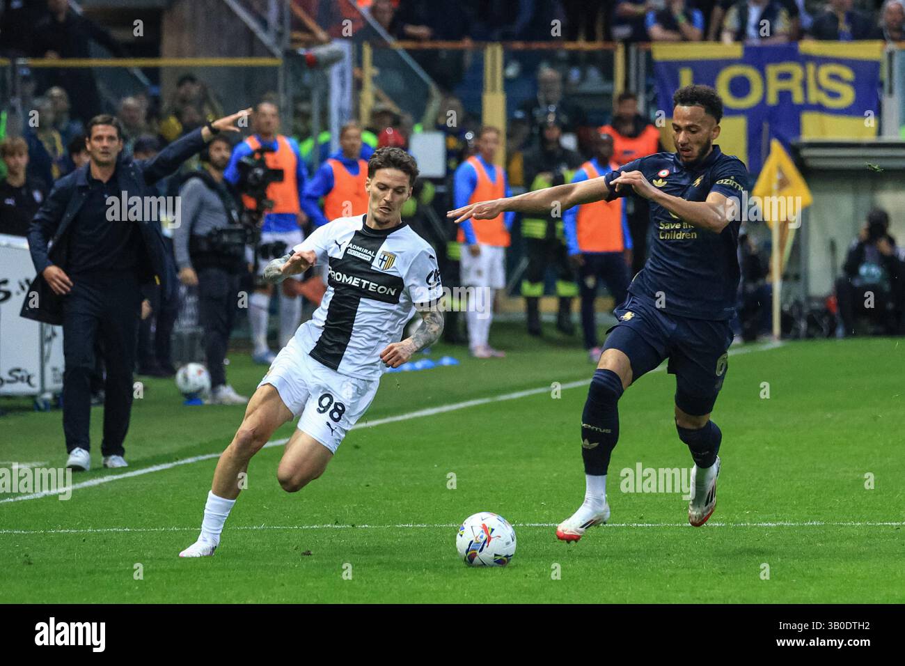 Parma, Italy. 24th Apr, 2025. Dennis Man (Parma Calcio) fights for the ...