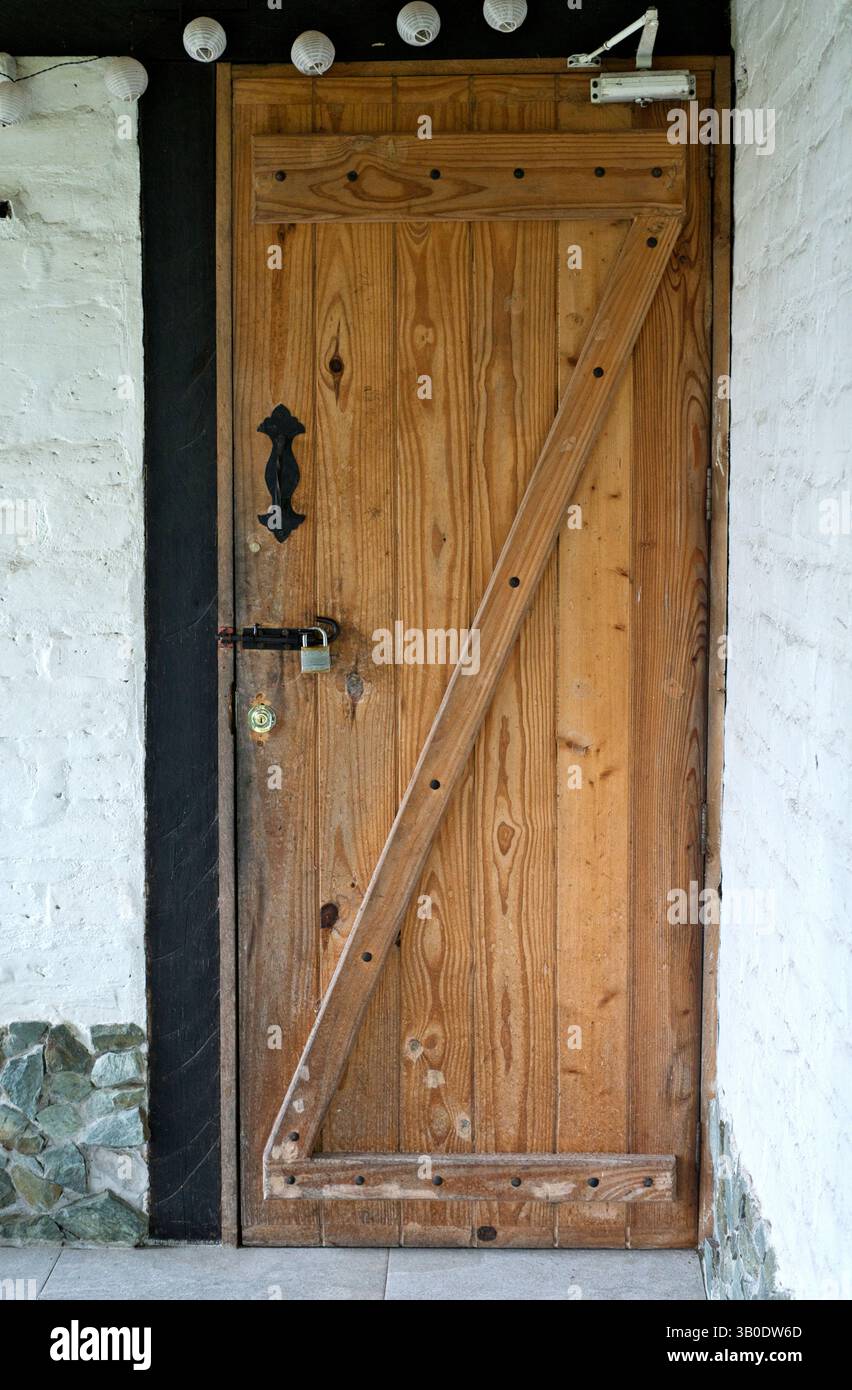 A Beautiful Rustic Wooden Door Featuring a Unique Design and Quality ...