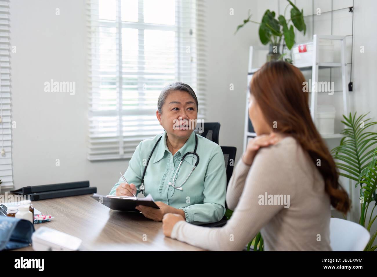 Patient Consultation and Medical Assessment. A healthcare professional ...