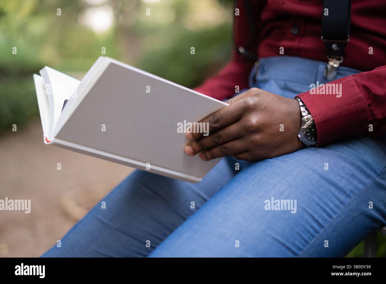 Professor enjoying reading book hi-res stock photography and images - Alamy