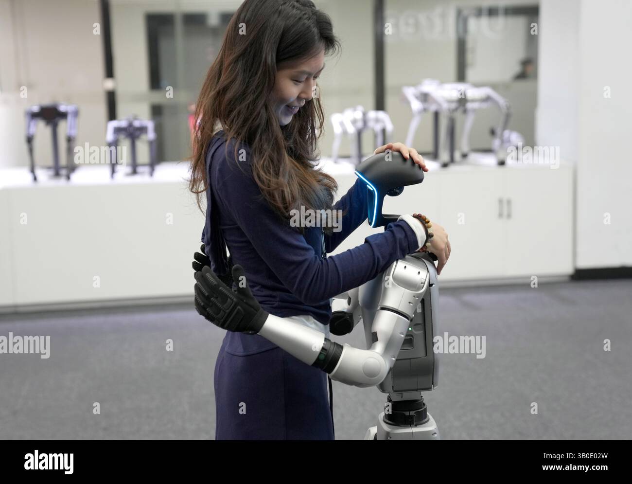 (250424) -- BEIJING, April 24, 2025 (Xinhua) -- A Unitree G1 humanoid robot shows hugging action ...