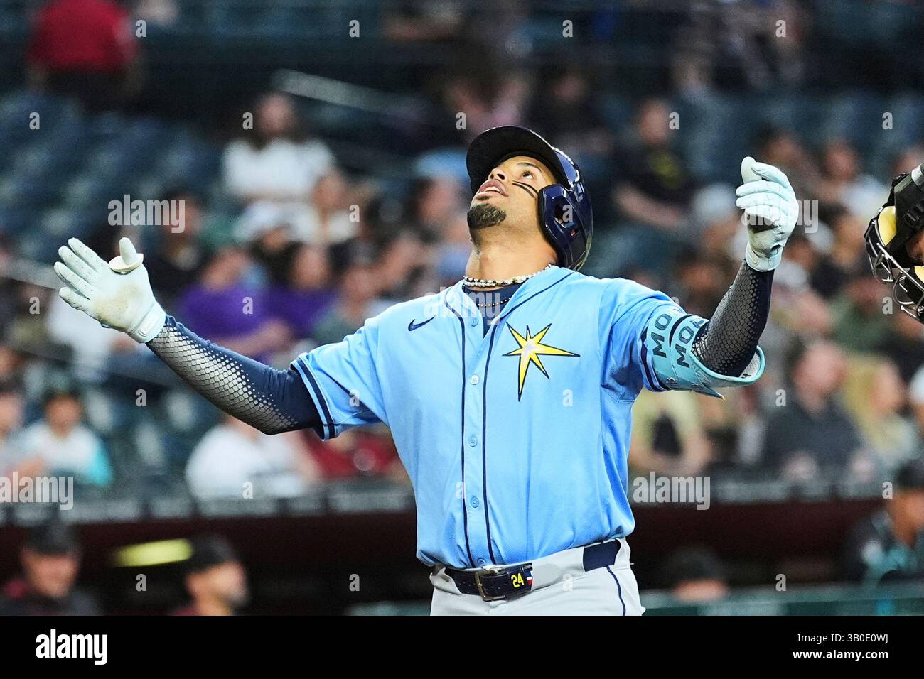 Tampa Bay Rays' Christopher Morel looks up as he celebrates his home ...