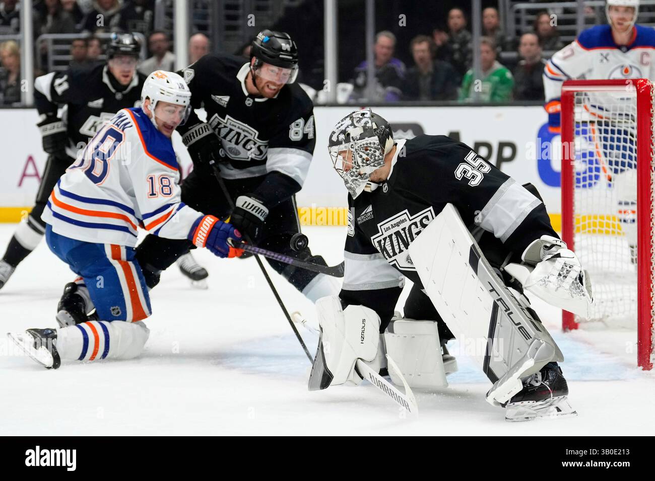 Edmonton Oilers left wing Zach Hyman, left, tries to score on Los ...