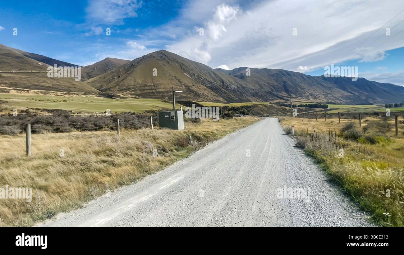 Surrounded by mountain ranges the extreme arid dry farming fields in ...