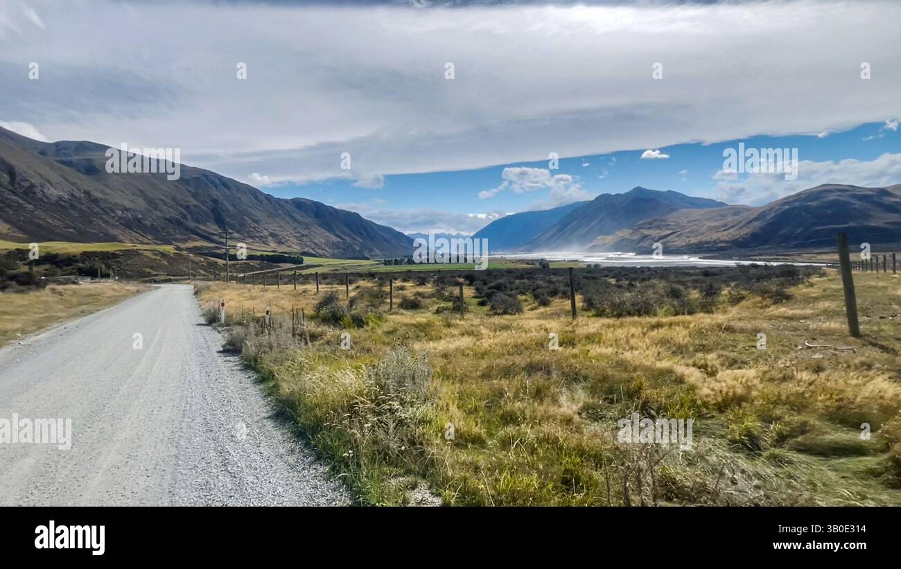 Surrounded by mountain ranges the extreme arid dry farming fields in ...