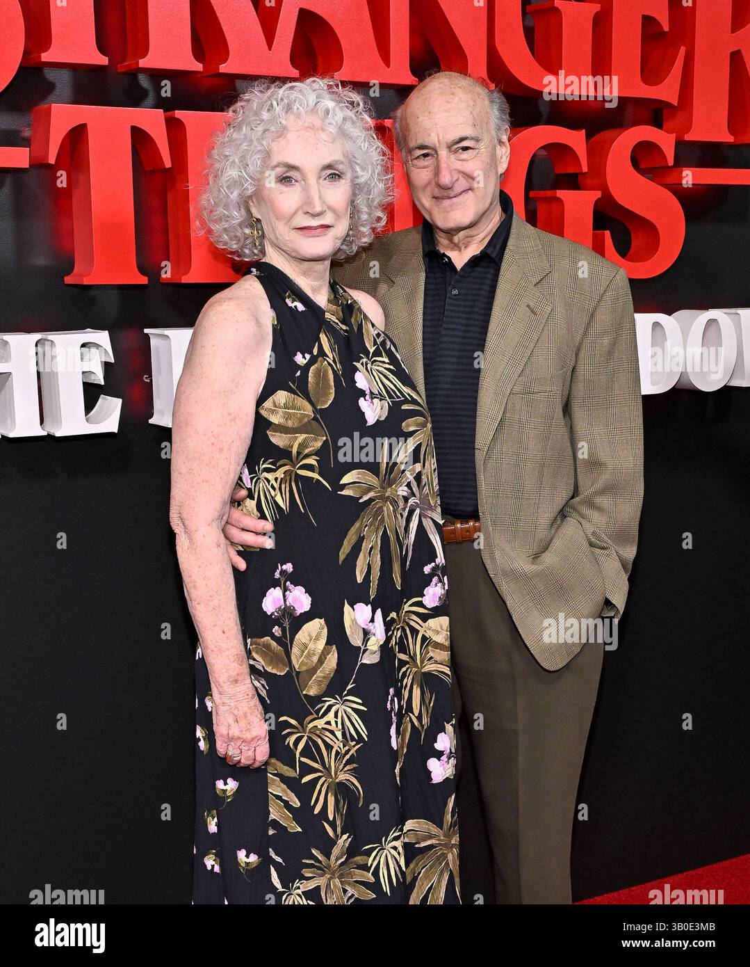 Caitlin O'Connell, left, and Peter Friedman attend "Stranger Things ...