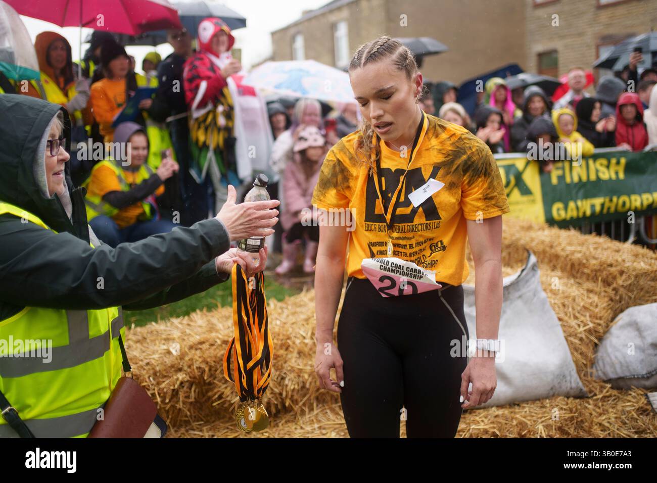 Jodie Ounsley, who plays Fury in the British TV show "Gladiators," reacts after finishing the ...