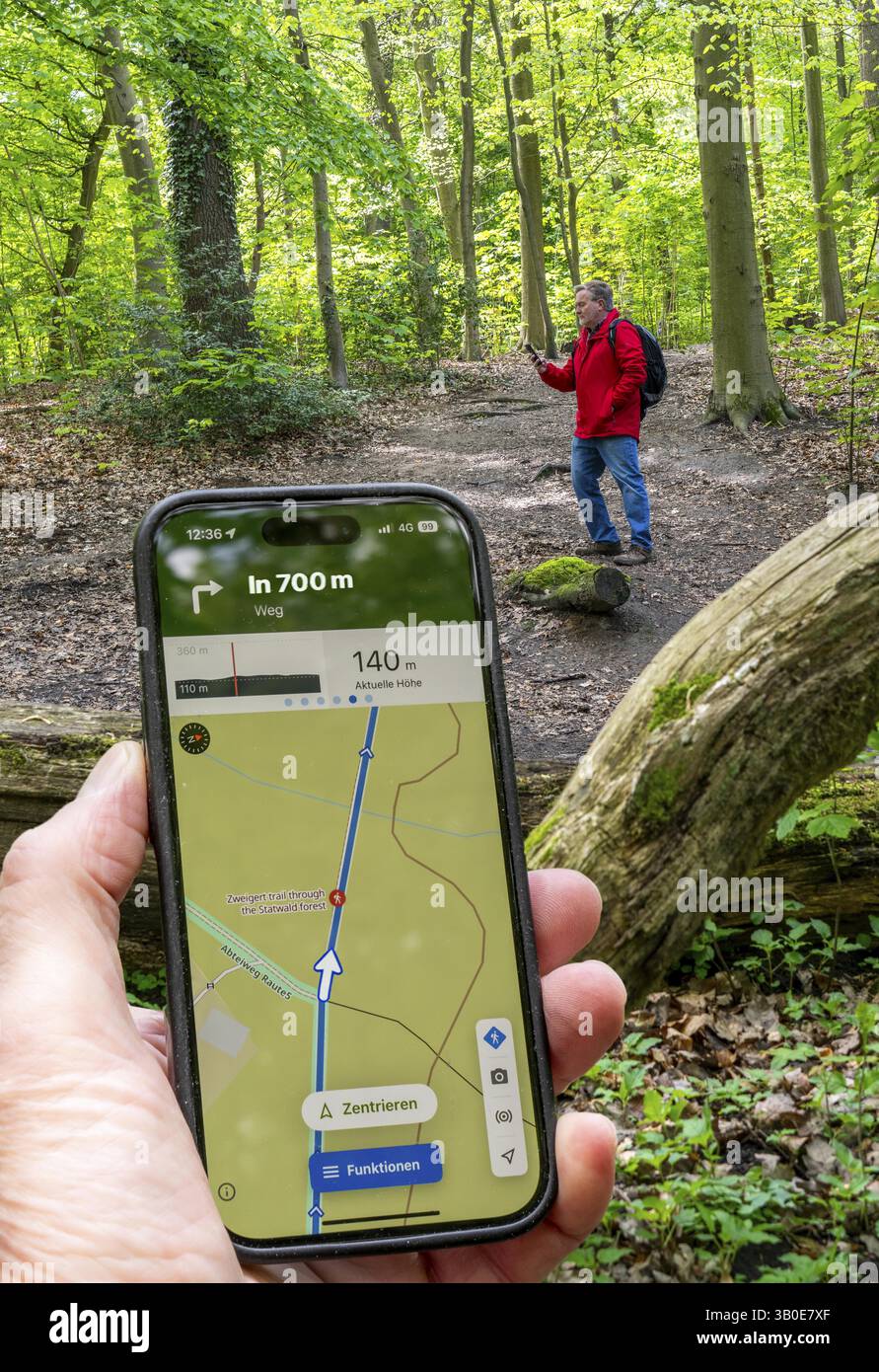 Symbolic image Hiking with smartphone and hiking app, navigation on ...