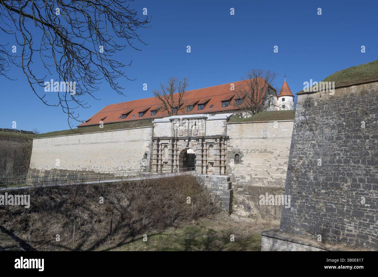 Entrance gate with fortress wall and moat of the Hohenzollern fortress ...