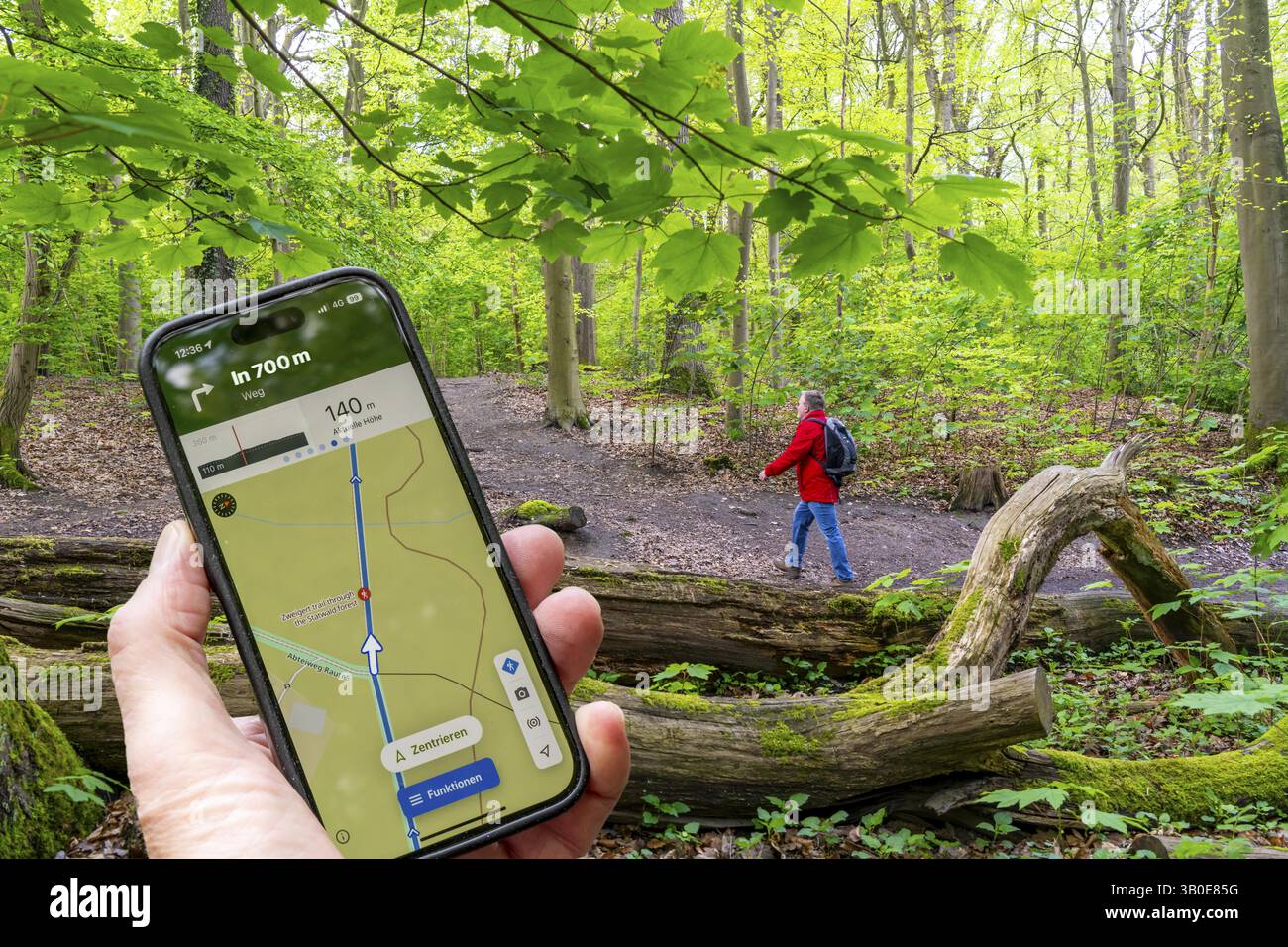 Symbolic image Hiking with smartphone and hiking app, navigation on ...