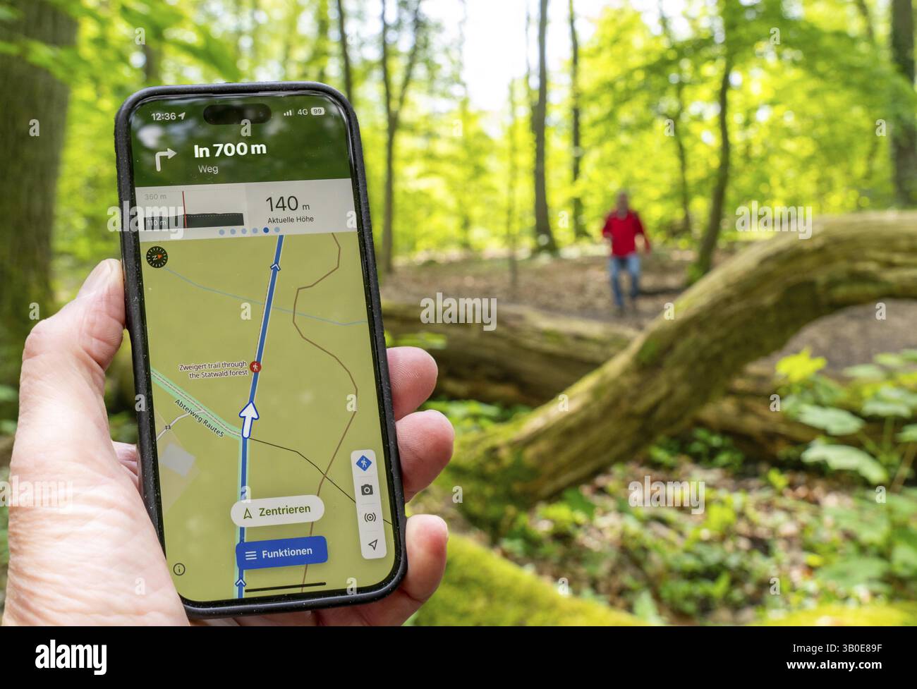 Symbolic image Hiking with smartphone and hiking app, navigation on ...