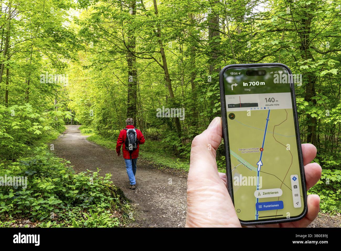 Symbolic image Hiking with smartphone and hiking app, navigation on ...
