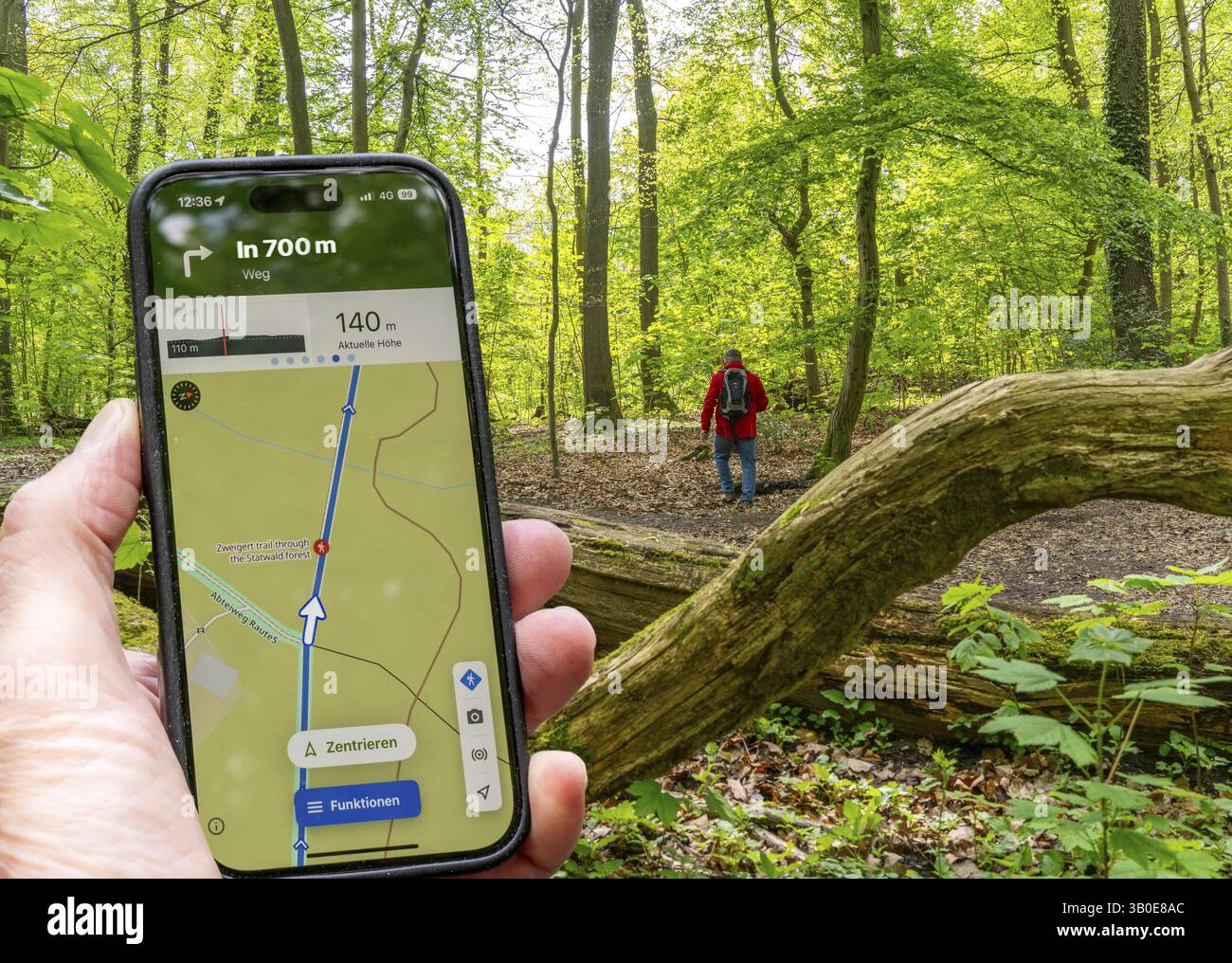 Symbolic image Hiking with smartphone and hiking app, navigation on ...
