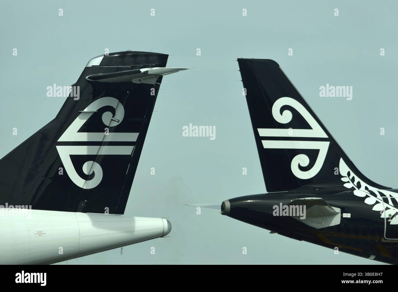 Air New Zealand logos on the tails of aircraft waiting at the domestic ...