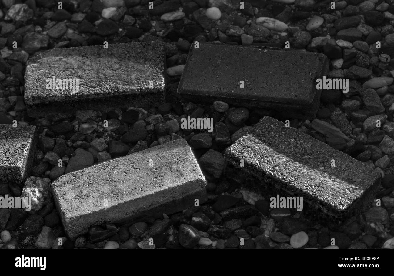 Sunrise Geometry: Rectangle Stones in the Lake Stock Photo - Alamy