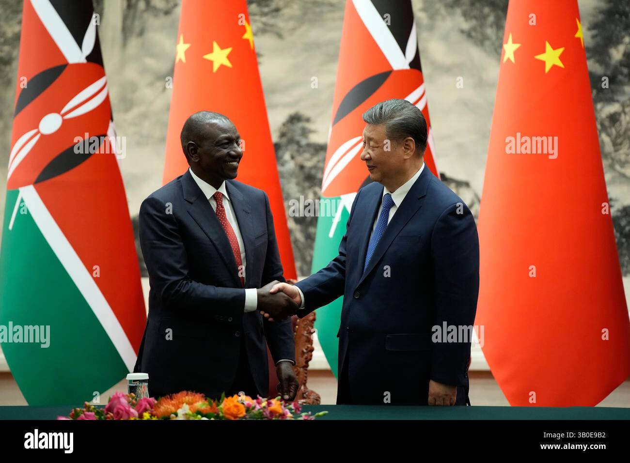 Chinese President Xi Jinping, right, and Kenyan President William Ruto ...