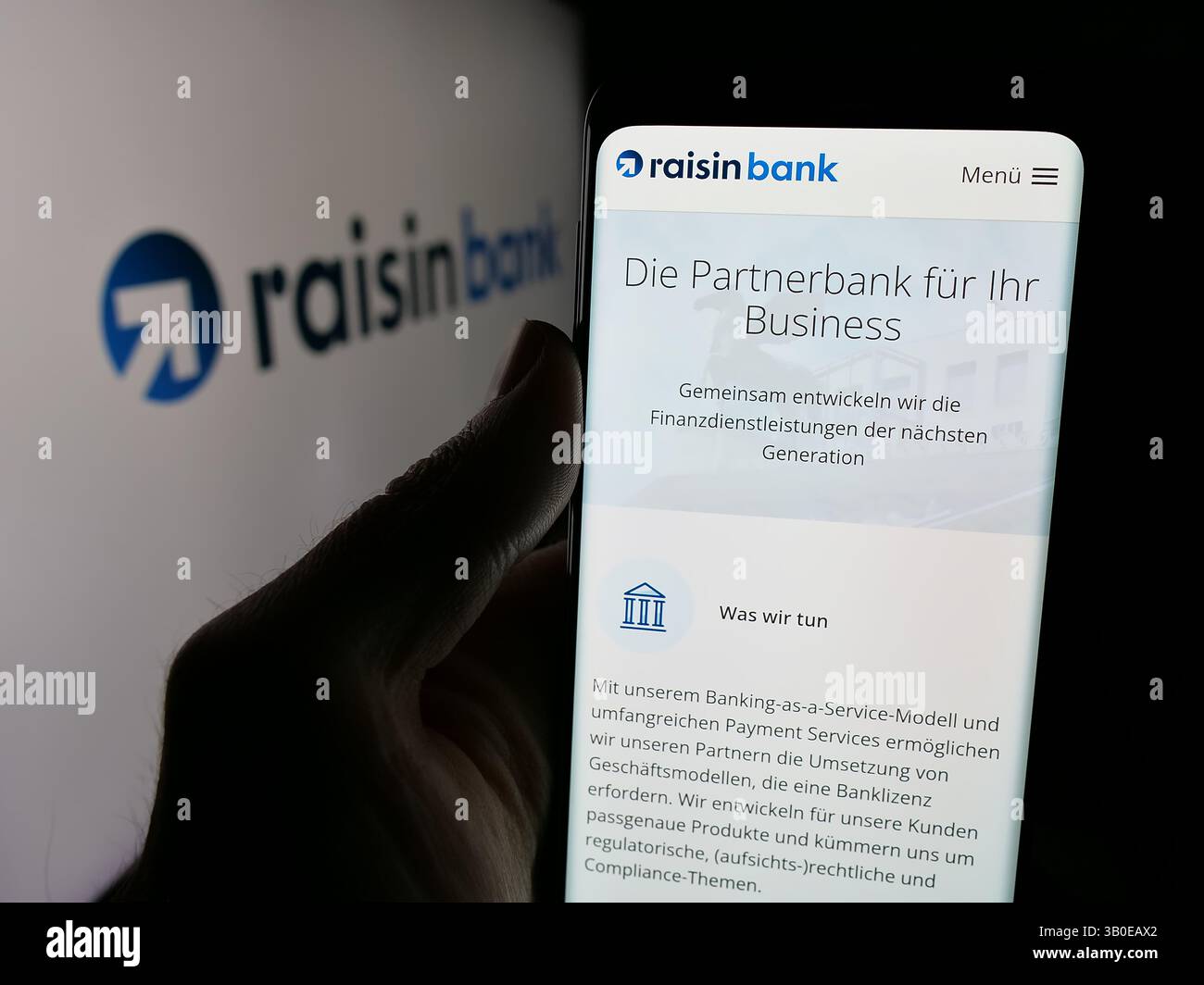 In this photo illustration, a cellphone with the webpage of German ...