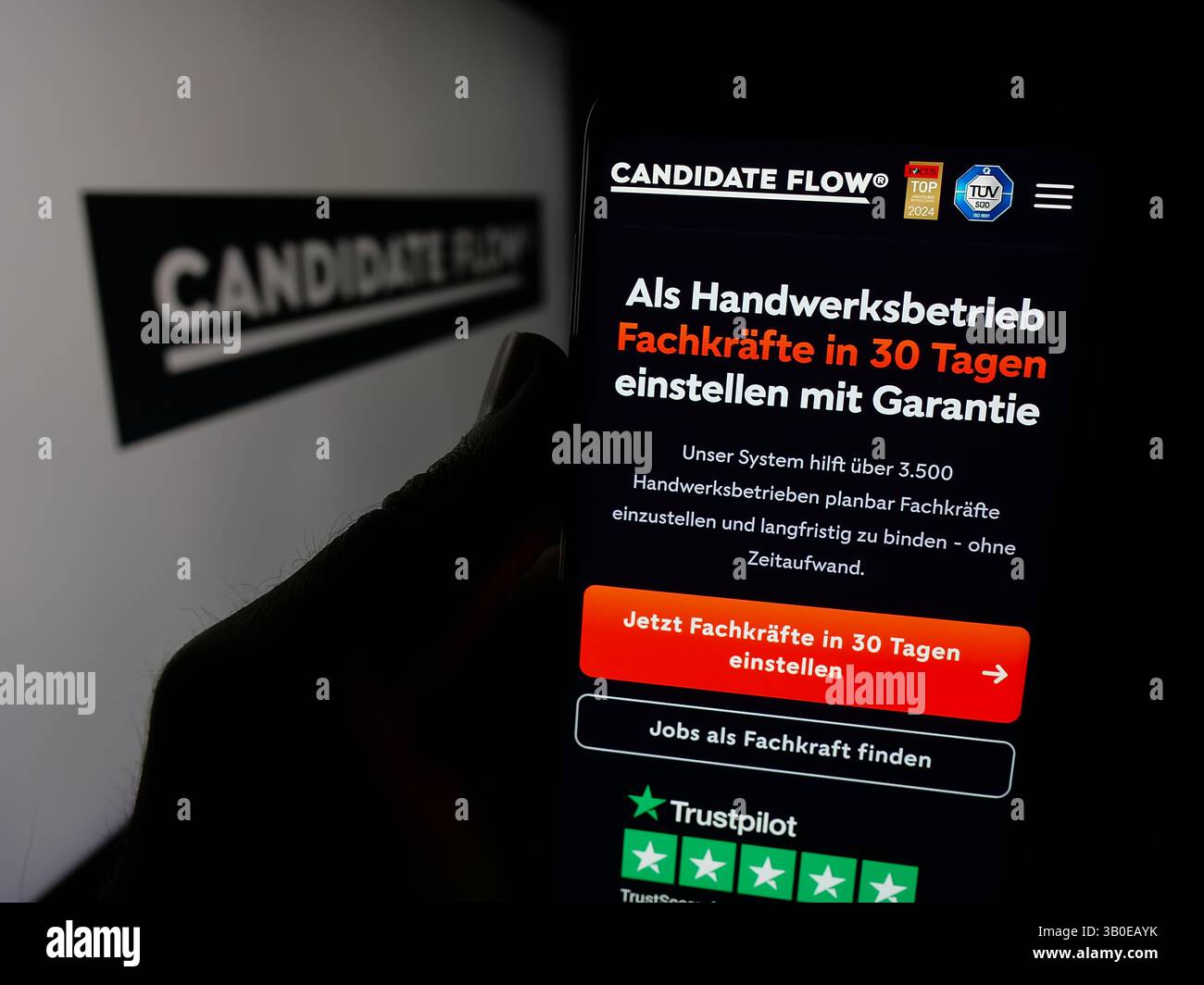 In this photo illustration, a smartphone with the website of German ...