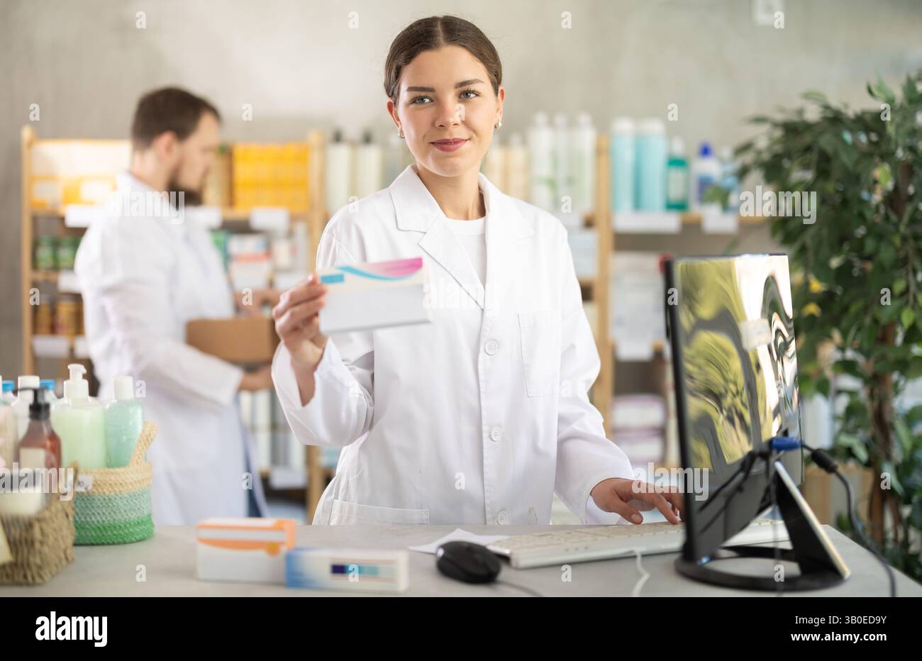 Male pharmacist puts on medical hi-res stock photography and images - Alamy