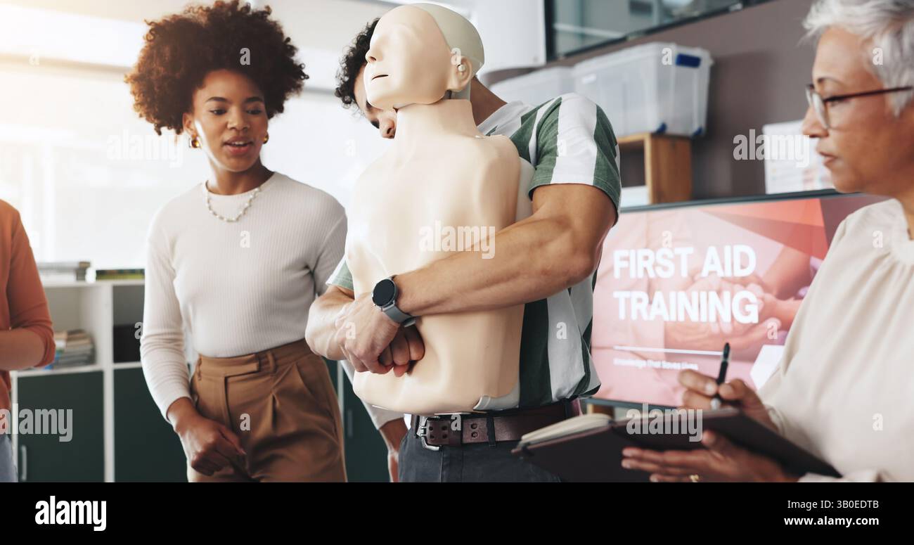 First aid, training and people with choking dummy for CPR, abdominal ...