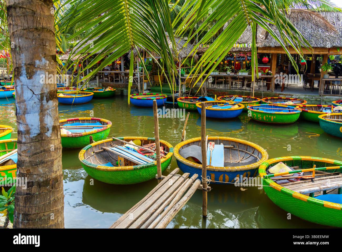 Tourists enjoy, coconut boat ride at Cam thanh village outside Hoi An ...
