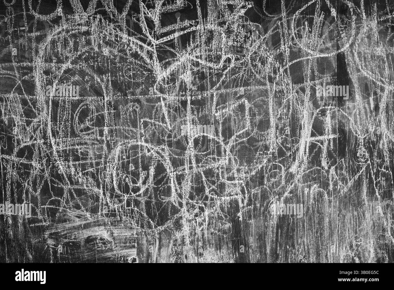 scribbles and shapes on chalkboard made by kids with white chalk at ...