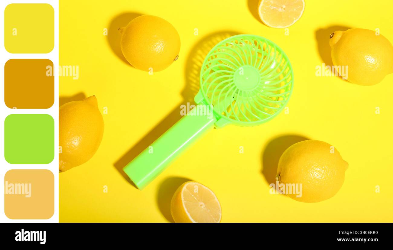 Portable electric fan with lemons on yellow background. Different color ...