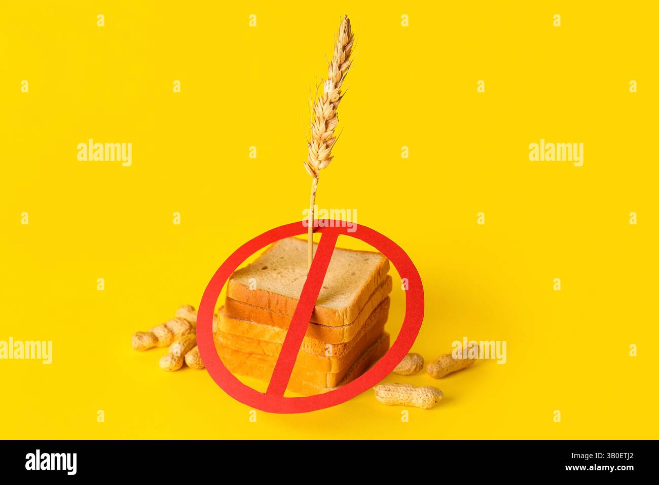 Bread with cashew nuts and stop sign on yellow background. Food Allergy ...