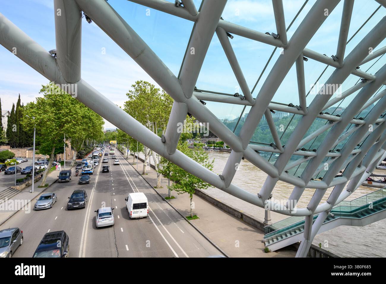 Peace bridge, steel and glass construction pedestrian bridge over Kura ...