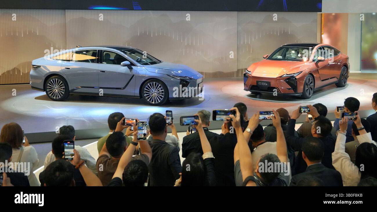 Toyota's Lexus unveils the new ES, ES500e (R) and ES350e at the ...