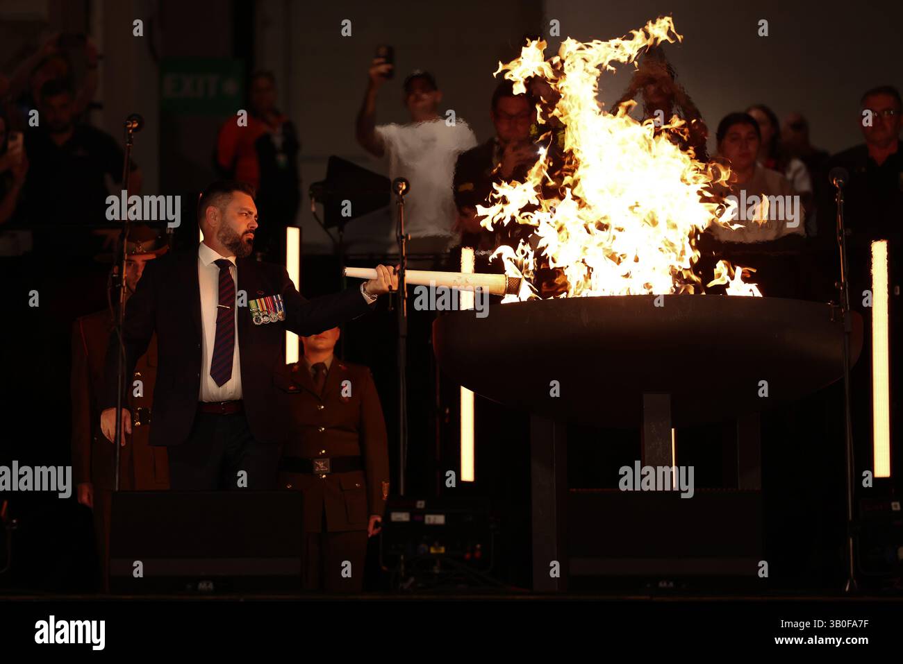 The cauldron is lit by Paul Warren, ex-veteran of Afghanistan, ahead of ...