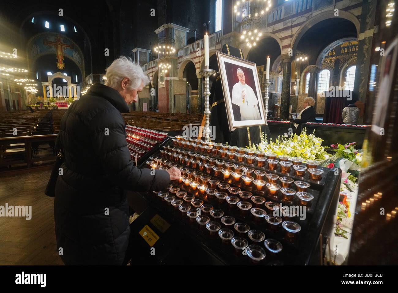 London UK 24 April 2025. Mourners continue to pay tribute and light ...