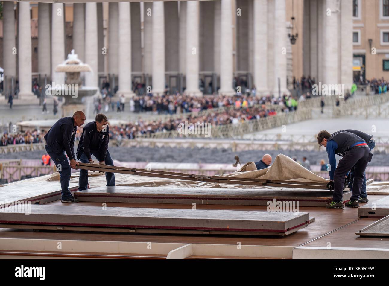 Vatican City, Vatican. 24th Apr, 2025. Workers prepare the altar for ...