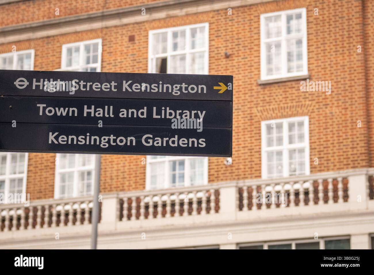 LONDON- APRIL 22, 2025: Directional pedestrian signage near High Street ...