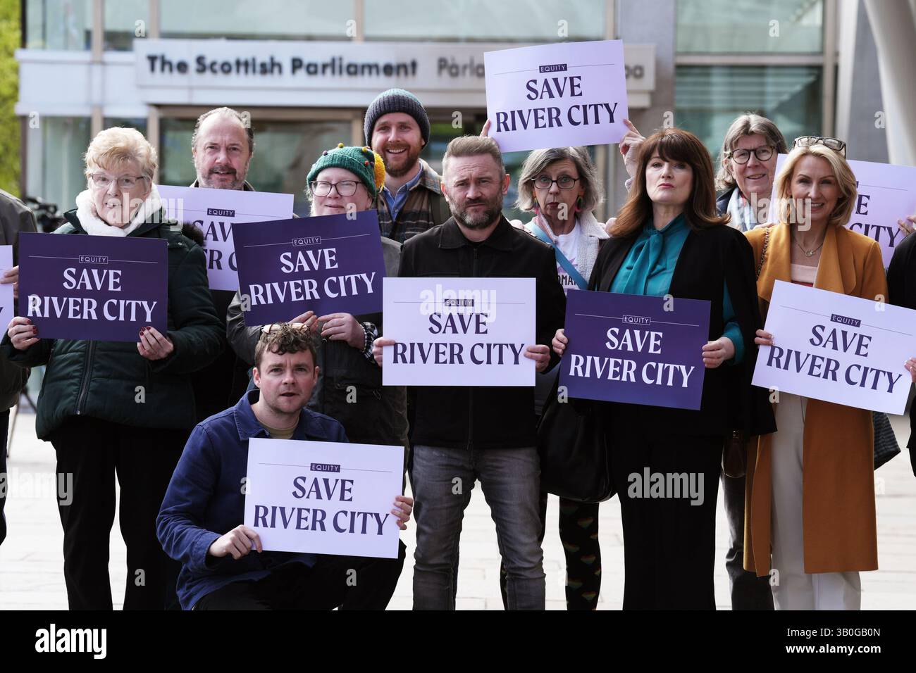 Stephen Purdon (centre) with the cast of River City as they visit ...