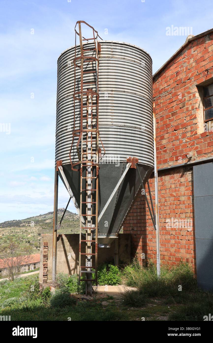 Galvanized silo on a farm in Spain Stock Photo - Alamy