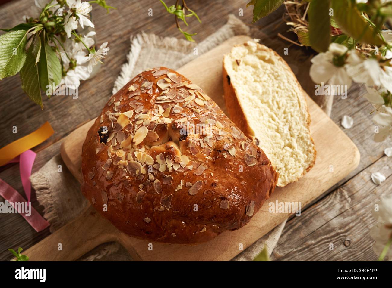 Mazanec, Czech sweet Easter pastry, with cherry blossoms in springtime ...