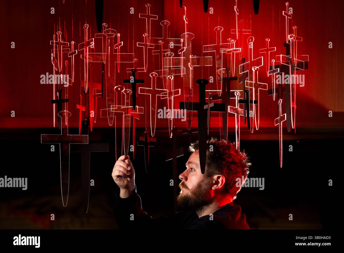 David McLeod puts the finishing touches to an installation featured in ...