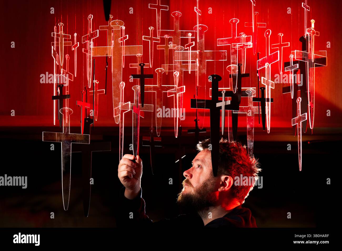 David McLeod puts the finishing touches to an installation featured in ...