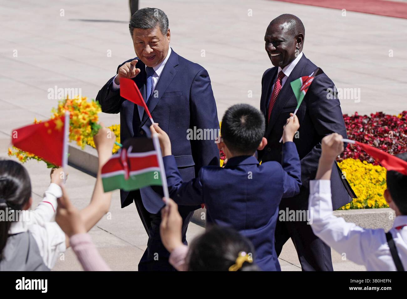 Kenyan President William Ruto (R) attends a welcoming ceremony with ...