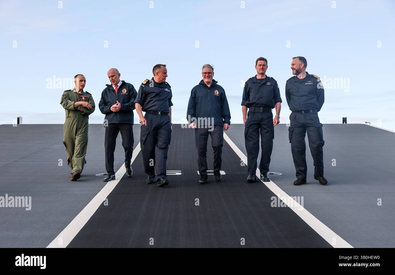 (left- right) Captain Colin McGannity (RN) Commander of the Carrier air ...