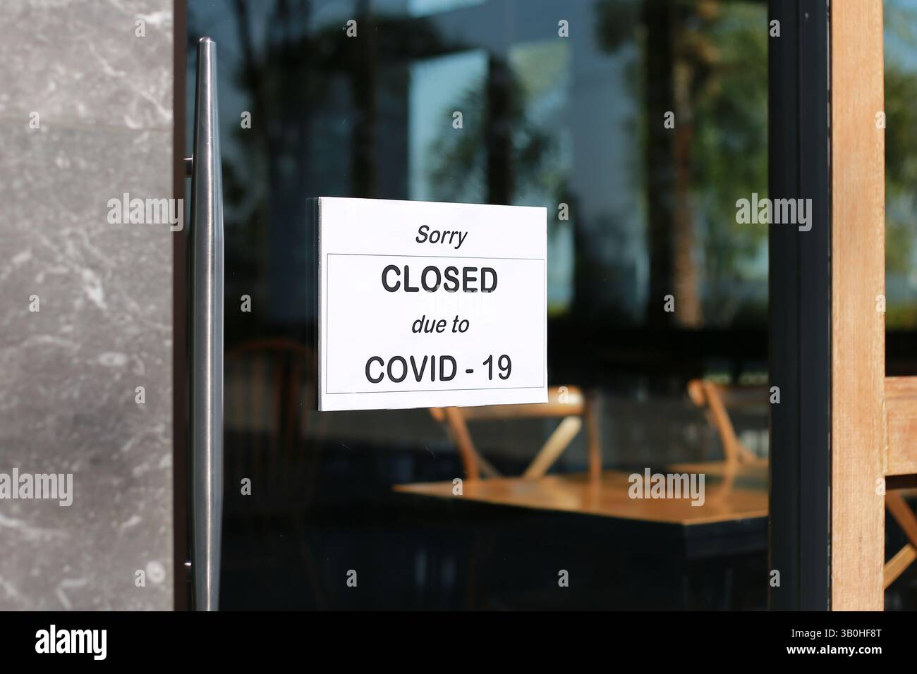 The sign in front of the office is temporarily closed Stock Photo - Alamy
