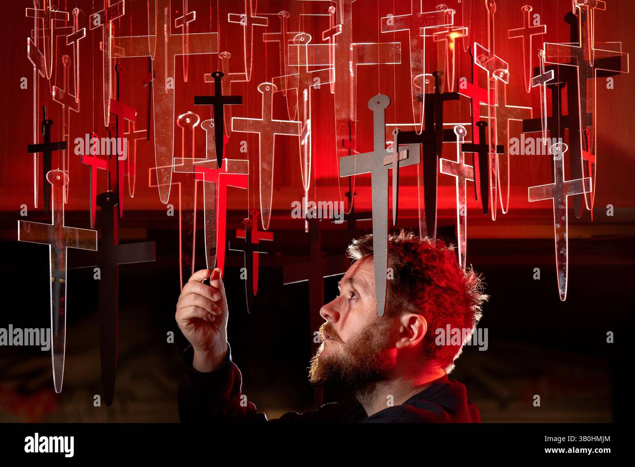 David McLeod puts the finishing touches to an installation featured in ...