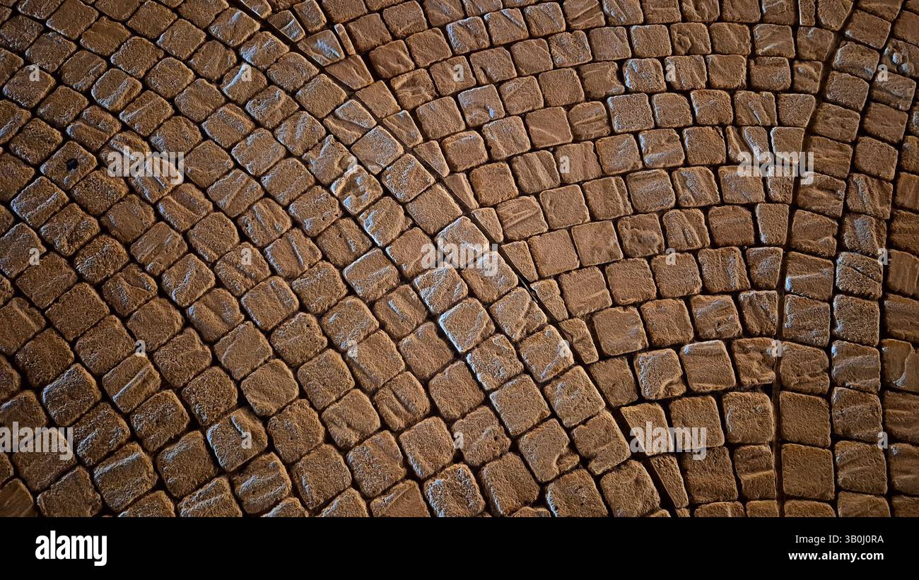 Detailed view of intricate cobblestone pavement design in Abu Dhabi ...